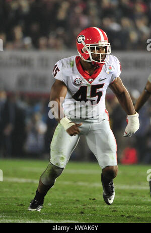 Georgia Bulldogs linebacker Reggie Carter (45) beats the block from ...