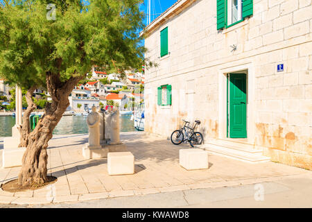 Pucisca town promenade in Croatia, Island Brac Stock Photo - Alamy