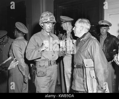 1st Marine Div. Gen. Oliver Smith, talks with Maj Gen Edward M. Almond ...