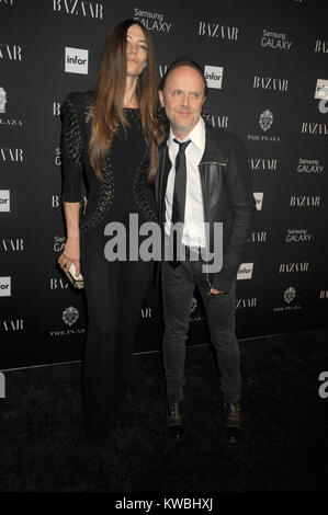 Jessica Miller and Lars Ulrich attending the 59th Grammy Awards in Los ...