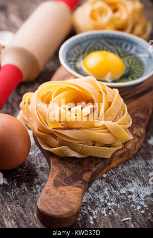 Dry Italian tagliatelle pasta background healthy food photo Top view ...
