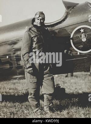 Brigadier General Billy Mitchell, in aviator's clothes, standing beside ...