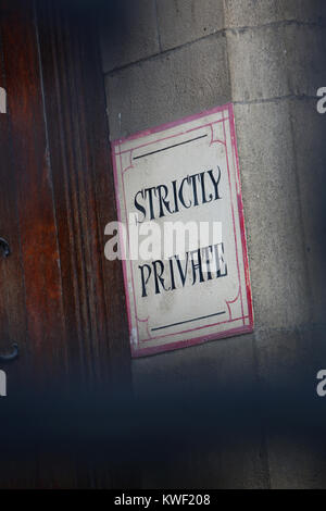 A Strictly Private sign photographed behind cast iron gates in London ...