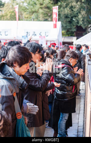 Hatsumode, the first shrine visit of "shogatsu" (New Year), purchasing ...