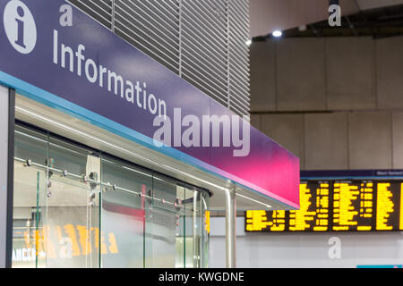 A Network Rail access point information sign next to a low bridge ...