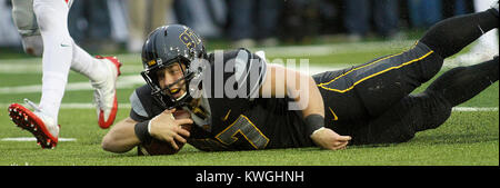 Iowa long snapper Tyler Kluver catches a pass on a fake field goal ...