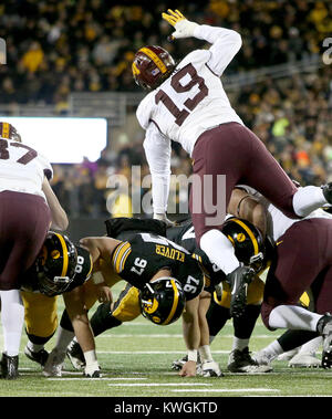 Iowa long snapper Tyler Kluver catches a pass on a fake field goal ...