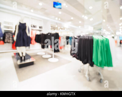 Abstract blur clothing boutique display interior of shopping mall ...