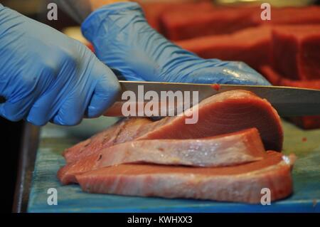 japanese chef cutting tuna fish for sushi and sashimi menu for Stock ...