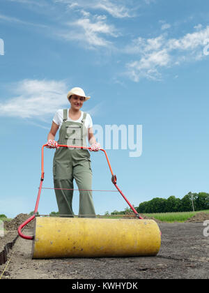 Manual ground leveling Roller Stock Photo - Alamy