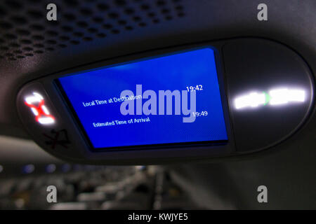 Aeroplane aircraft flight monitor showing arrival time at destination ...