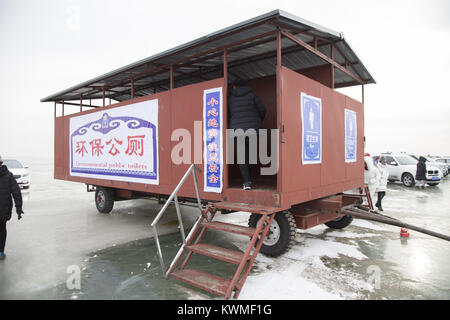Songyuan, China's Jilin Province. 28th Dec, 2014. Fishermen introduce ...
