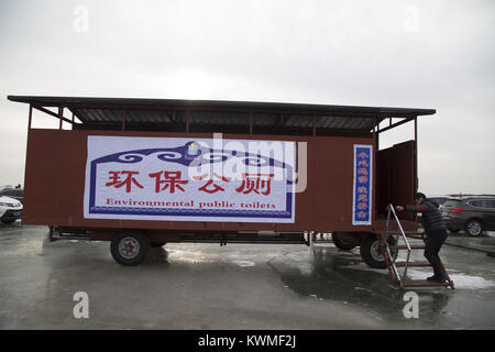 Songyuan, China's Jilin Province. 28th Dec, 2014. Fishermen introduce ...