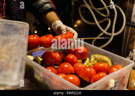 Cooking on the street for the people walking on a holiday Stock Photo ...