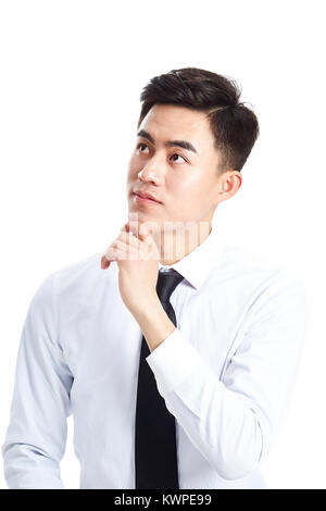 Studio shot of Japanese man thinking in black and white Stock Photo - Alamy