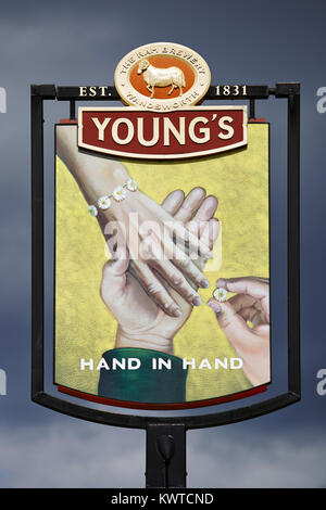 Hand in Hand pub signage in Wimbledon, London Stock Photo - Alamy