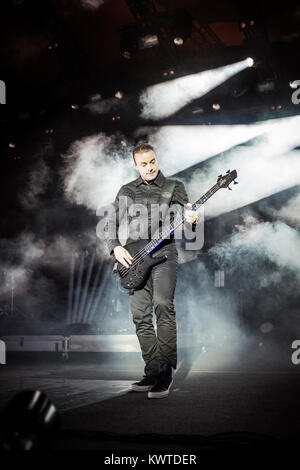 Christopher Wolstenholme of Muse performs on stage at the 02 Arena in ...