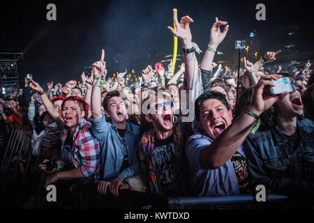 Enthusiastic and energetic music fans and festivalgoers enjoy every ...