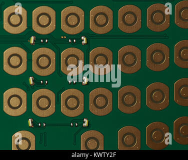 golden electric contacts of circuit board or battery Stock Photo - Alamy