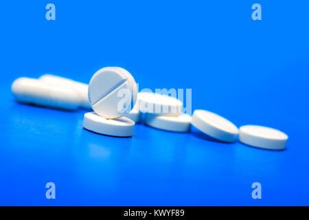 Extreme closeup of few pills on white background with copy space Stock ...