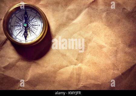 textured old paper background with compass symbol Stock Photo - Alamy