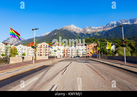 Innsbruck bridge through the Inn river. Innsbruck is the capital city ...
