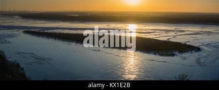 Winter view of the Volga river in the city of Kimry and a ship ...