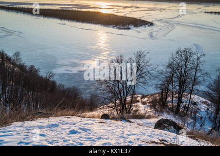 The bank of the Samara River with a beautiful sunset and reflecting ...