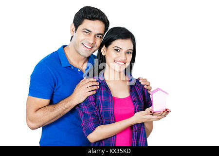 2 indian couple Dummy House showing Stock Photo - Alamy