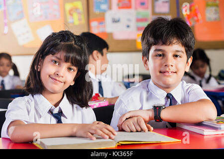 Indian School Kids Students Reading Book Study In Library Stock Photo ...