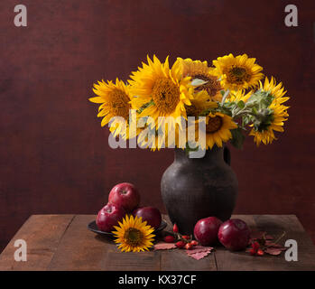 Sunflowers on wooden background, autumn flowers Stock Photo - Alamy