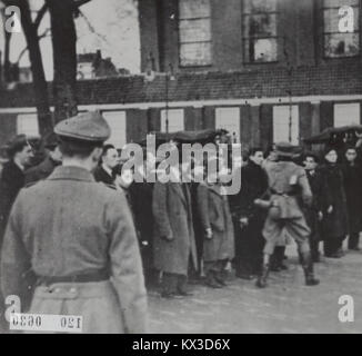 Photograph documenting a German raid at Jonas Daniël Meijerplein in ...