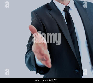 Business man saying welcome and giving hand Stock Photo - Alamy