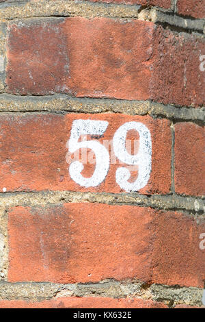 House Number 59 sign on wall Stock Photo - Alamy