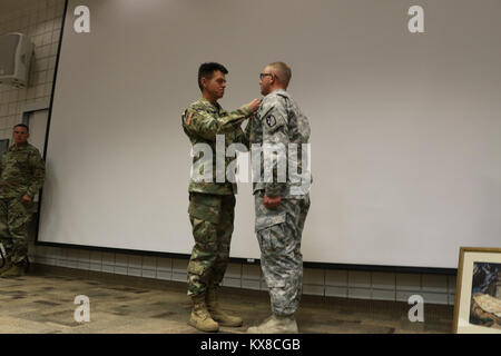 Sgt. Benjamin Rogers received the Utah Cross from Maj. Gen. Jefferson ...