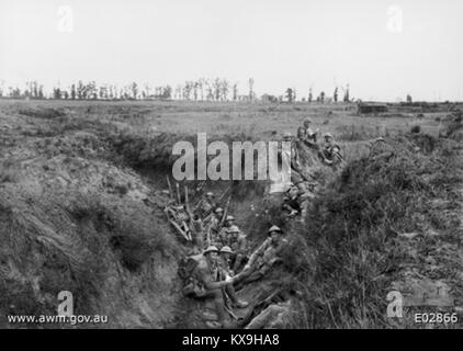 The image shows soldiers in a frontline trench during World War I ...