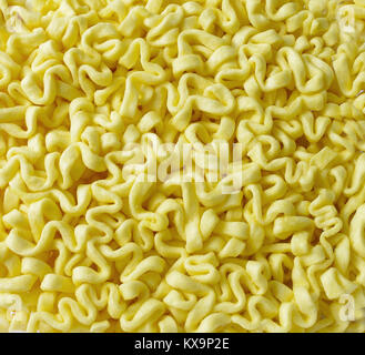 Texture of dry instant noodles isolated on black background. Raw dried ...