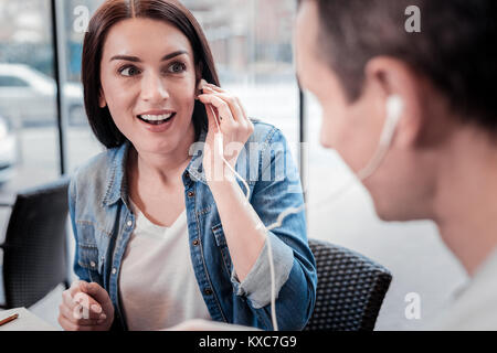 Surprised female person staring at her partner Stock Photo - Alamy