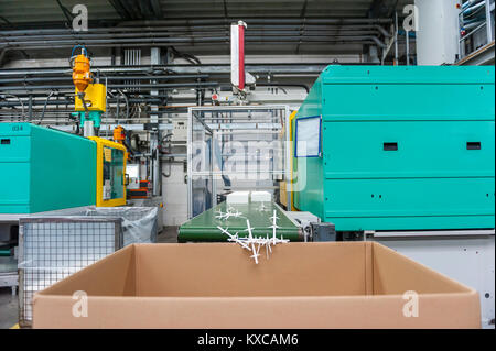 Production hall in plastic factory Stock Photo - Alamy