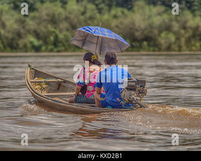 Amazon River, Brazil: - Dec 03, 2017: Small boat with locals on the ...