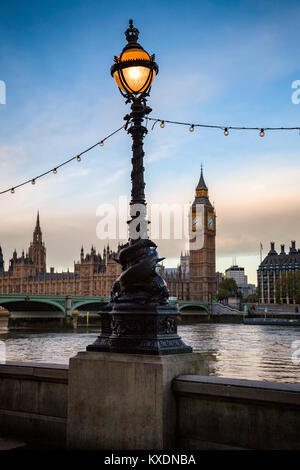 London cityscape with Dolphin lamp posts on the Queens Walk promenade ...