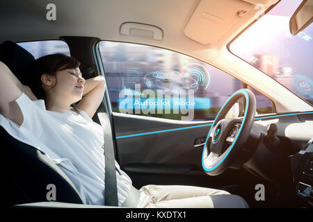 relaxed woman in autonomous car. self driving vehicle. autopilot ...