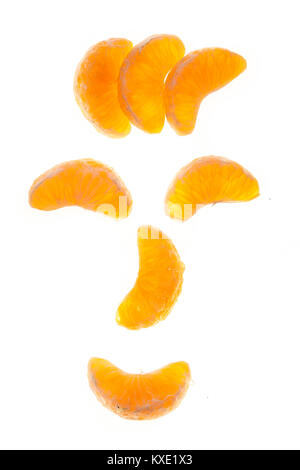 figures of clementine parts isolated on white background Stock Photo ...