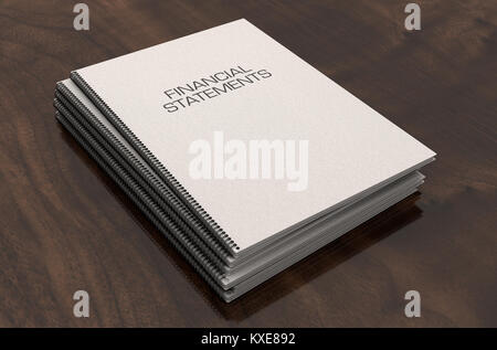 A pile of wire bound financial statement documents in a pile on a ...