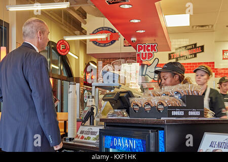 Serving counter inside American fast food restaurant Carl's Jr, Arizona ...