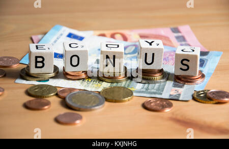 reward word written on wood block Stock Photo - Alamy