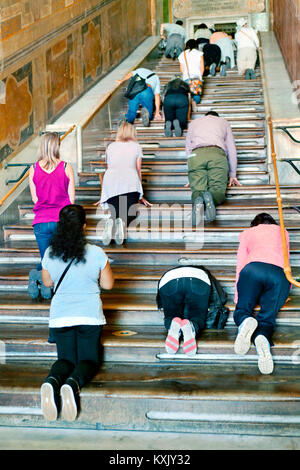 Pilgrims Climbing The Holy Stairs of Sancta Scala on their knees in ...