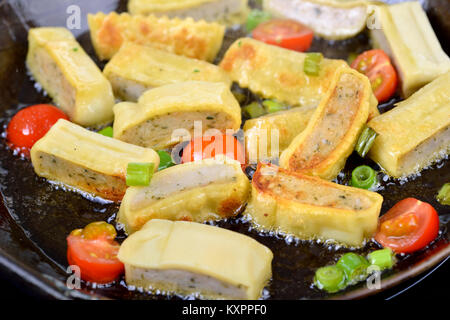 Swabian vegetable ravioli (so called 'Maultaschen') with mushroom cream ...