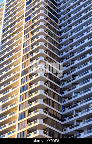 Detail of a high-rise facade with balconies on modernized prefabricated ...