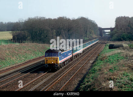 A Network SouthEast class 47 locomotive working a "Network Express ...